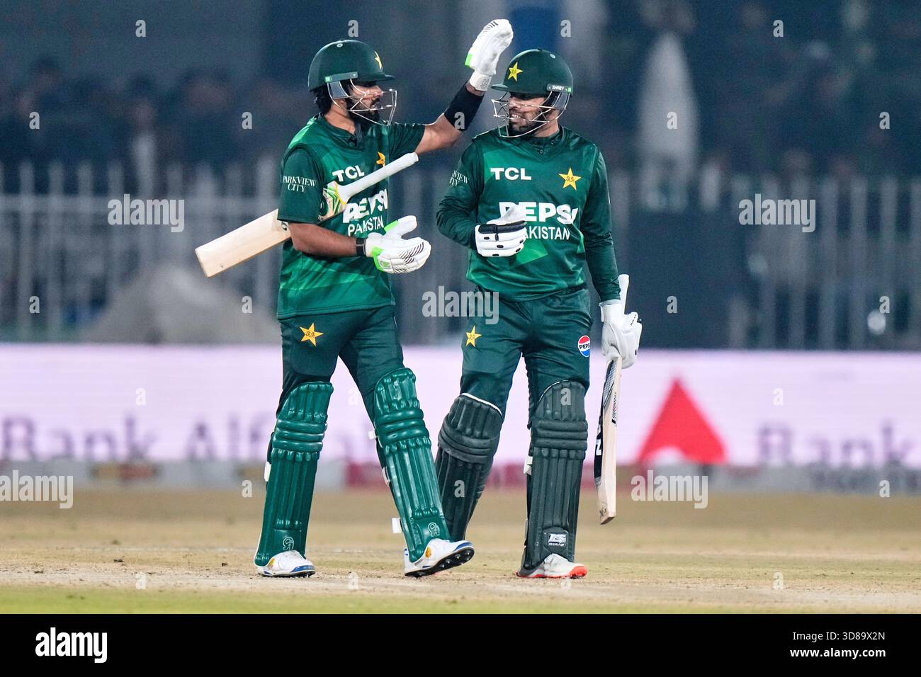 Pakistan's Babar Azam, left, Usman Khan celebrate after winning the ...