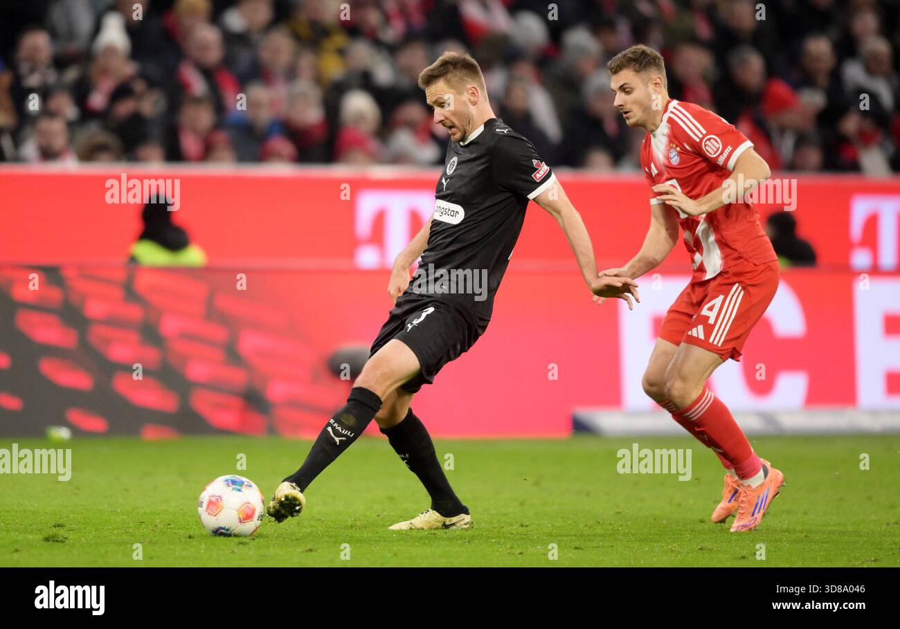 from left: Karol Mets, Josip Stanisic (Bayern) Munich, November 29 ...