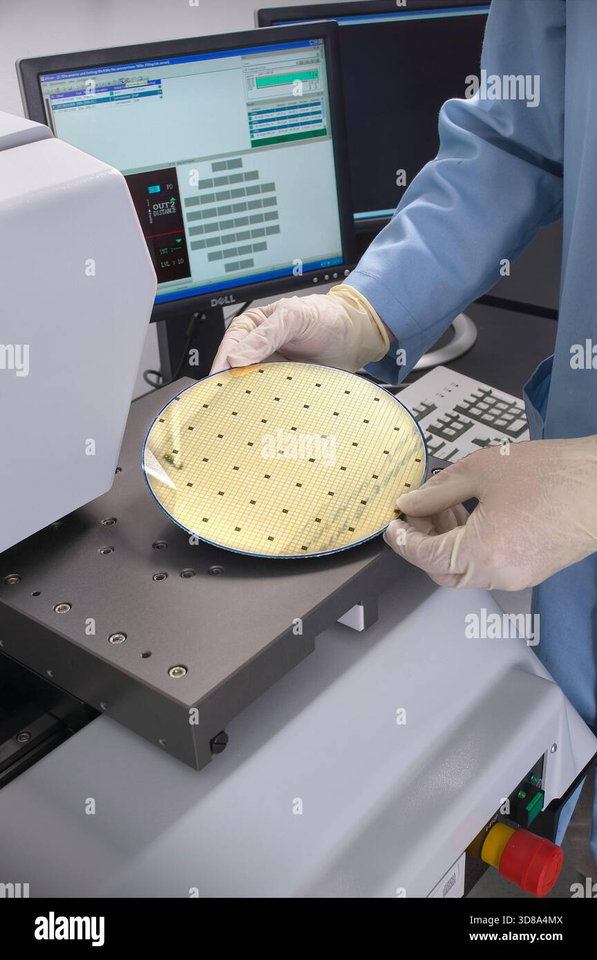Semiconductor wafer quality control hi-res stock photography and images ...