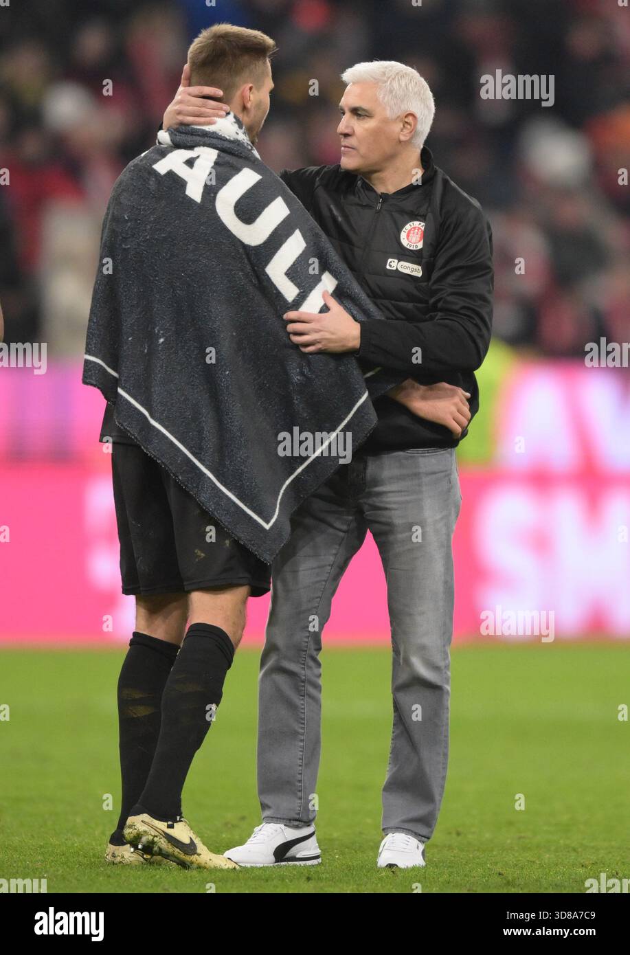 from left: Karol Mets, Andreas Bornemann (Head of Sports, St. Pauli ...