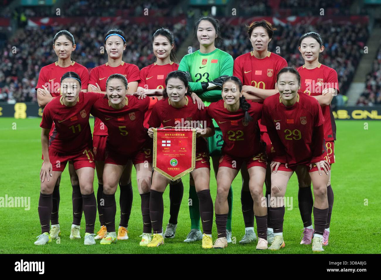 China's starting players pose for a team photo at the beginning of the ...