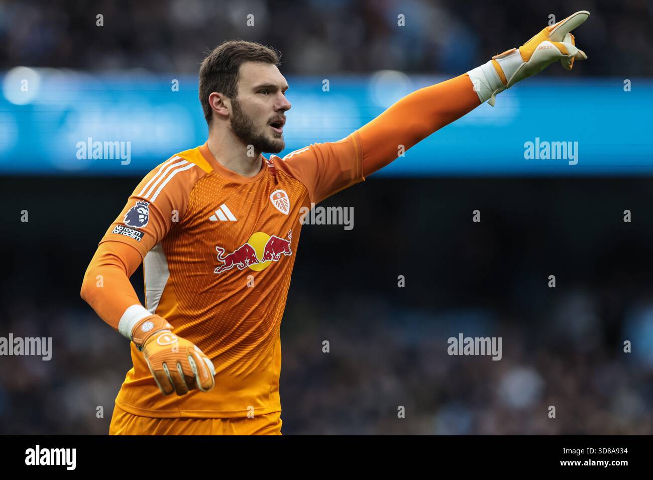 Leeds United goalkeeper Lucas Perri gives his team instructions during ...