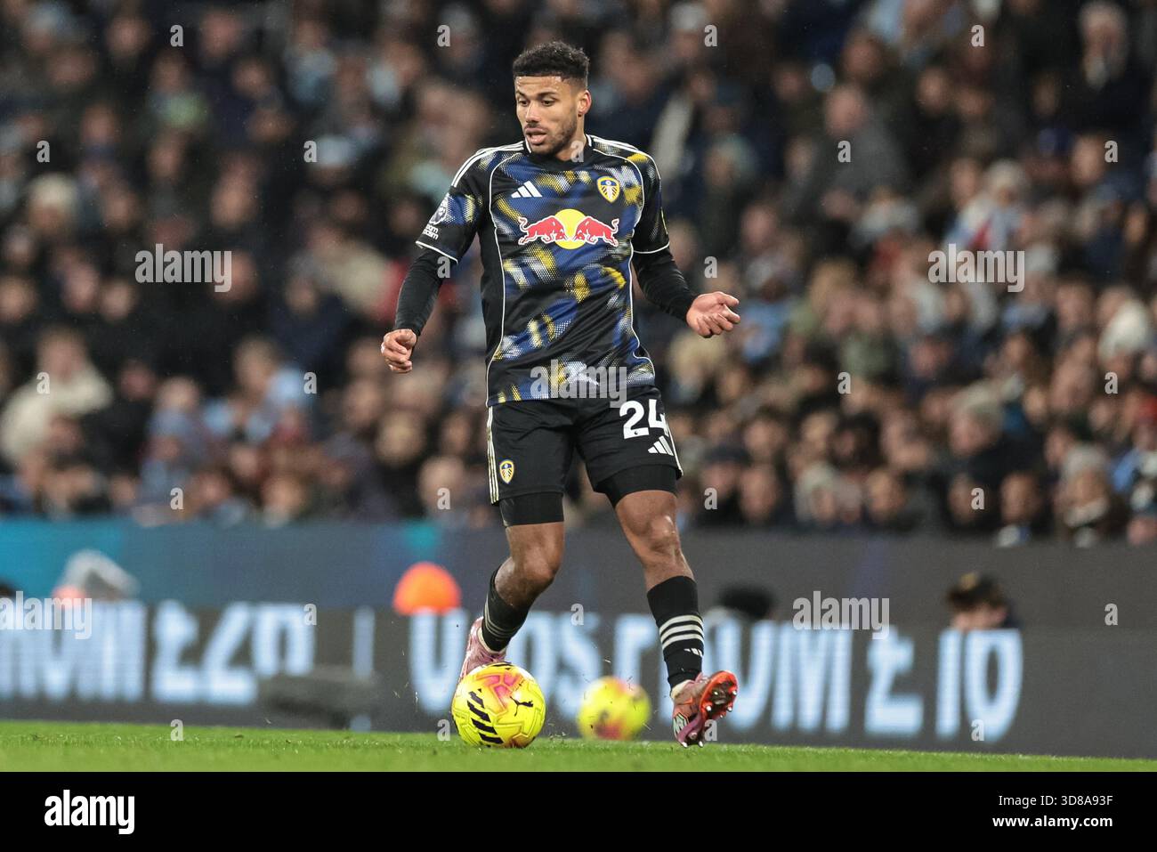 James Justin of Leeds United breaks with the ball during the Premier ...