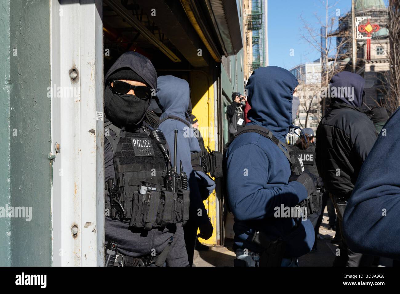NYPD and protestors outside an ICE raid in Chinatown, NY on Saturday ...