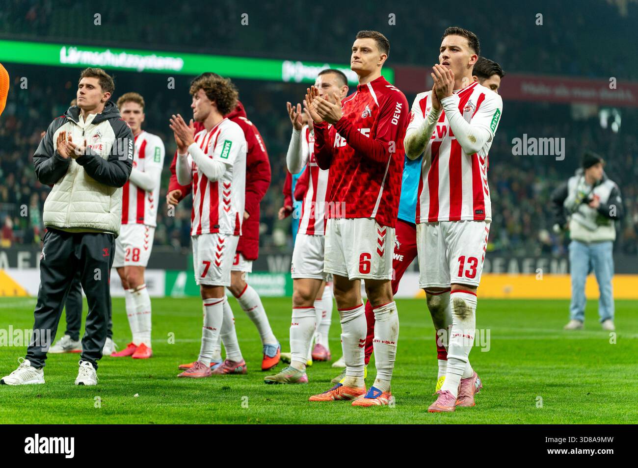 Cologne team after the game in front of the fans [supporters ...