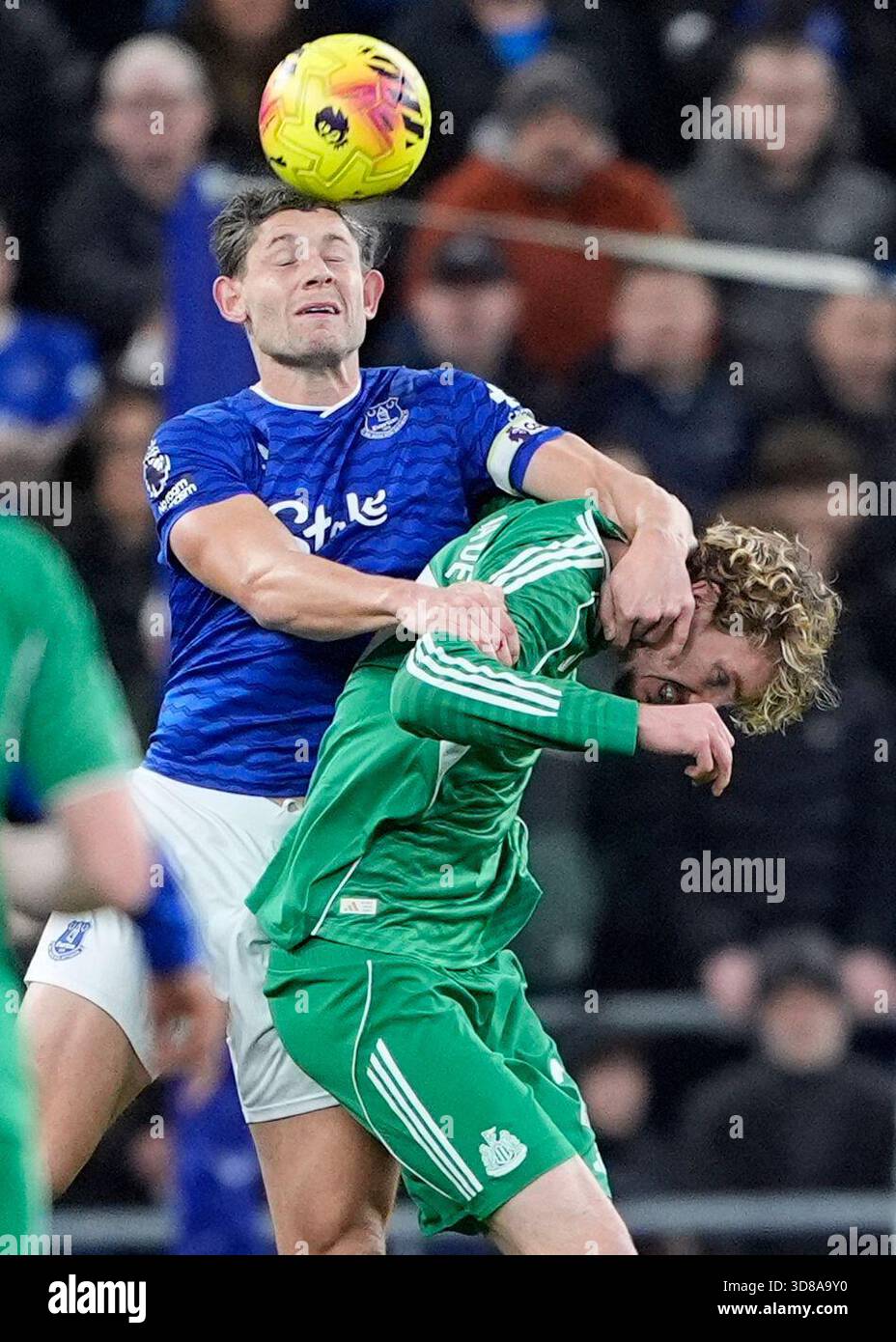 Everton's James Tarkowski (left) and Newcastle United's Nick Woltemade ...