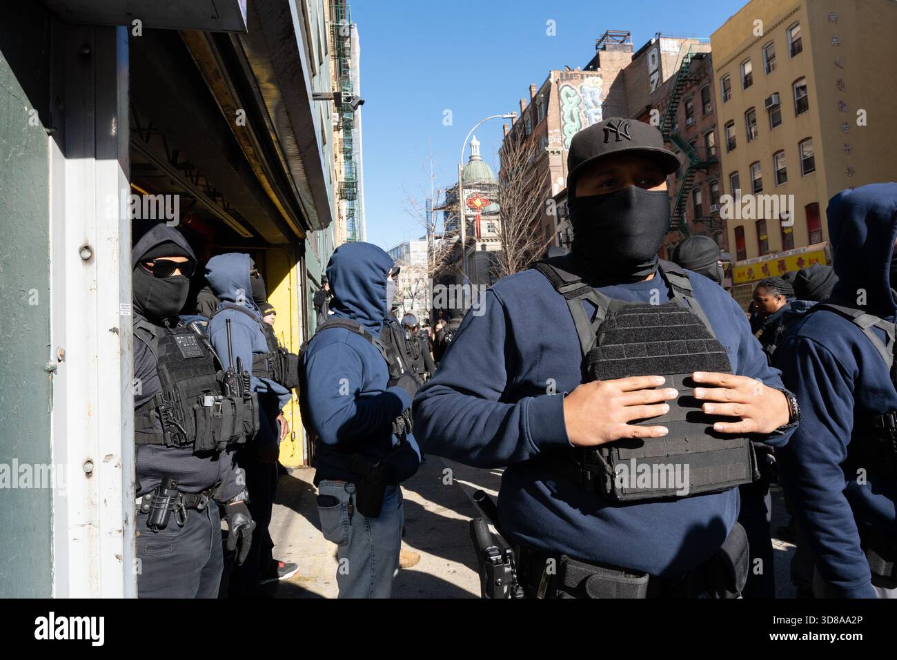 NYPD and protestors outside an ICE raid in Chinatown, NY on Saturday ...