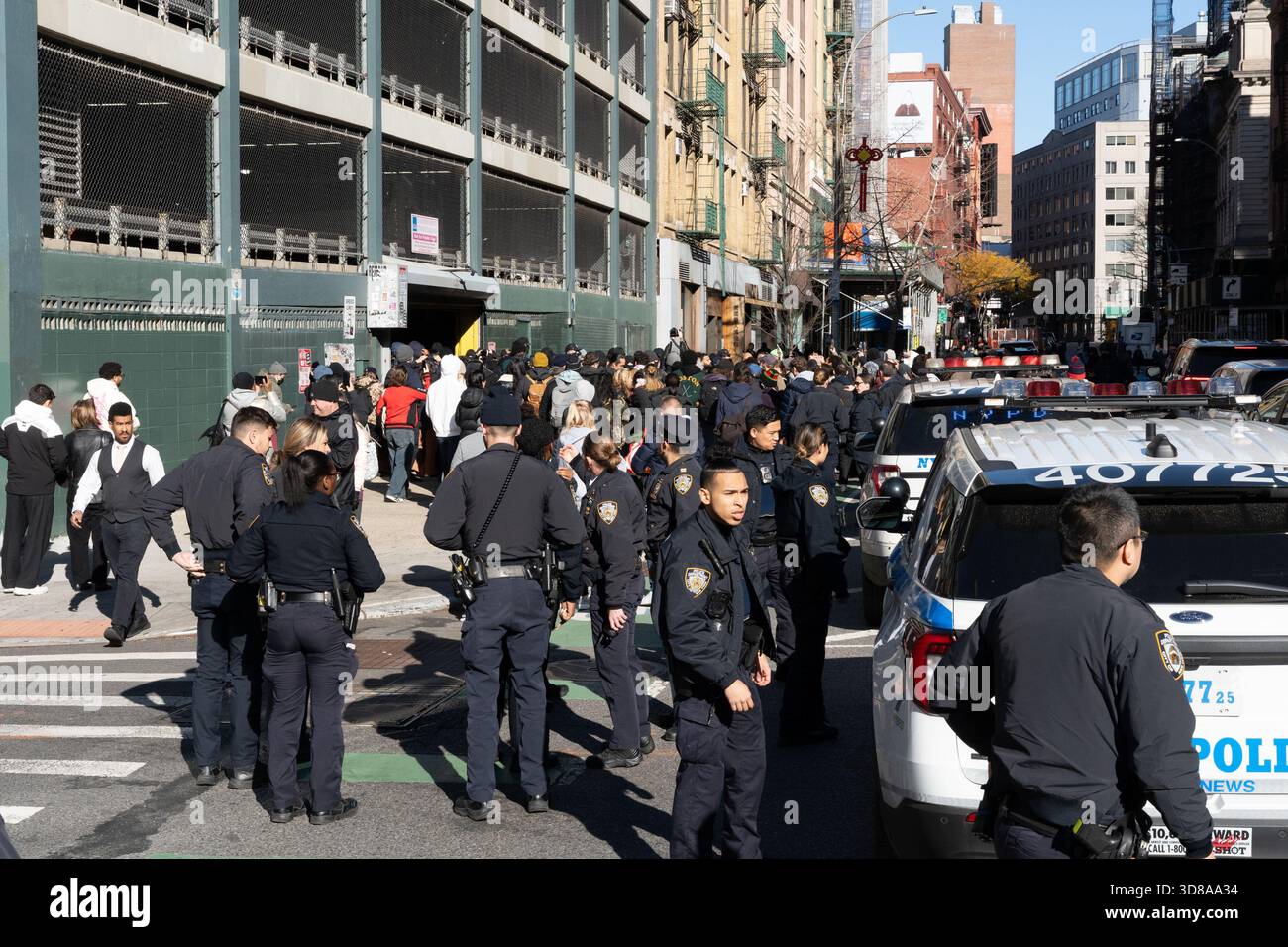 NYPD and protestors outside an ICE raid in Chinatown, NY on Saturday ...