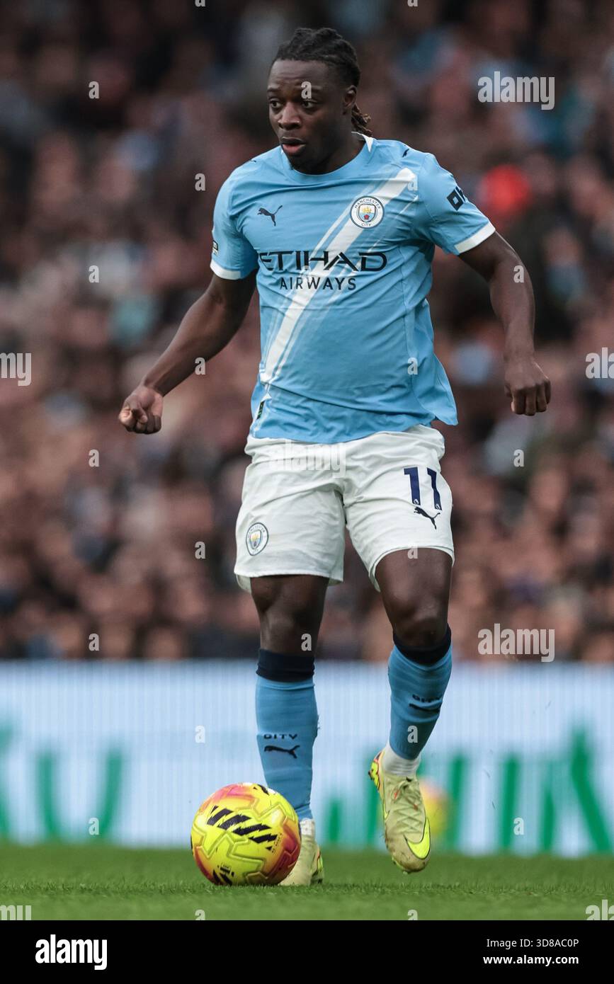Jeremy Doku of Manchester City breaks with the ball during the Premier League match Manchester ...