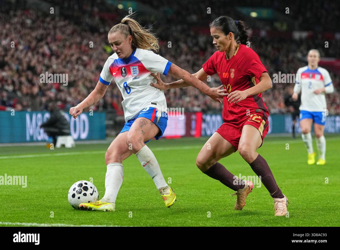 China's Chen Qiaozhu, right, challenges for the ball with England's ...