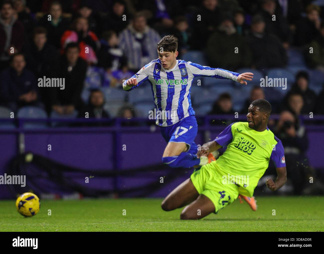 Odel Offiah of Preston North End slide tackles Charlie McNeill of ...