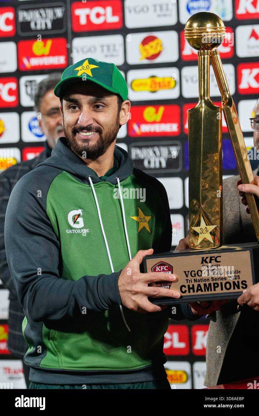 Pakistan's Salman Ali Agha receives winning trophy at a presentation ceremony on the end of the ...