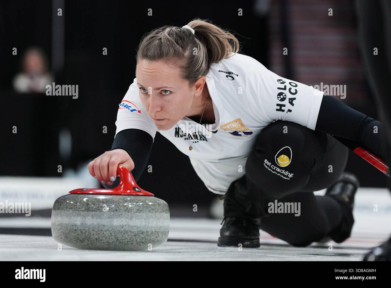 Skip Rachel Homan delivers a rock during the women's final at the ...