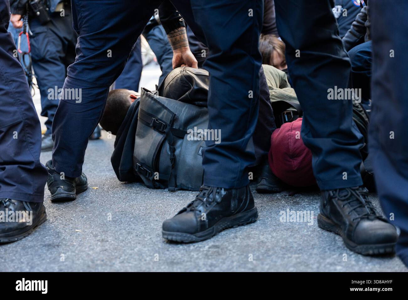 NYPD and protestors outside an ICE raid in Chinatown, NY on Saturday ...