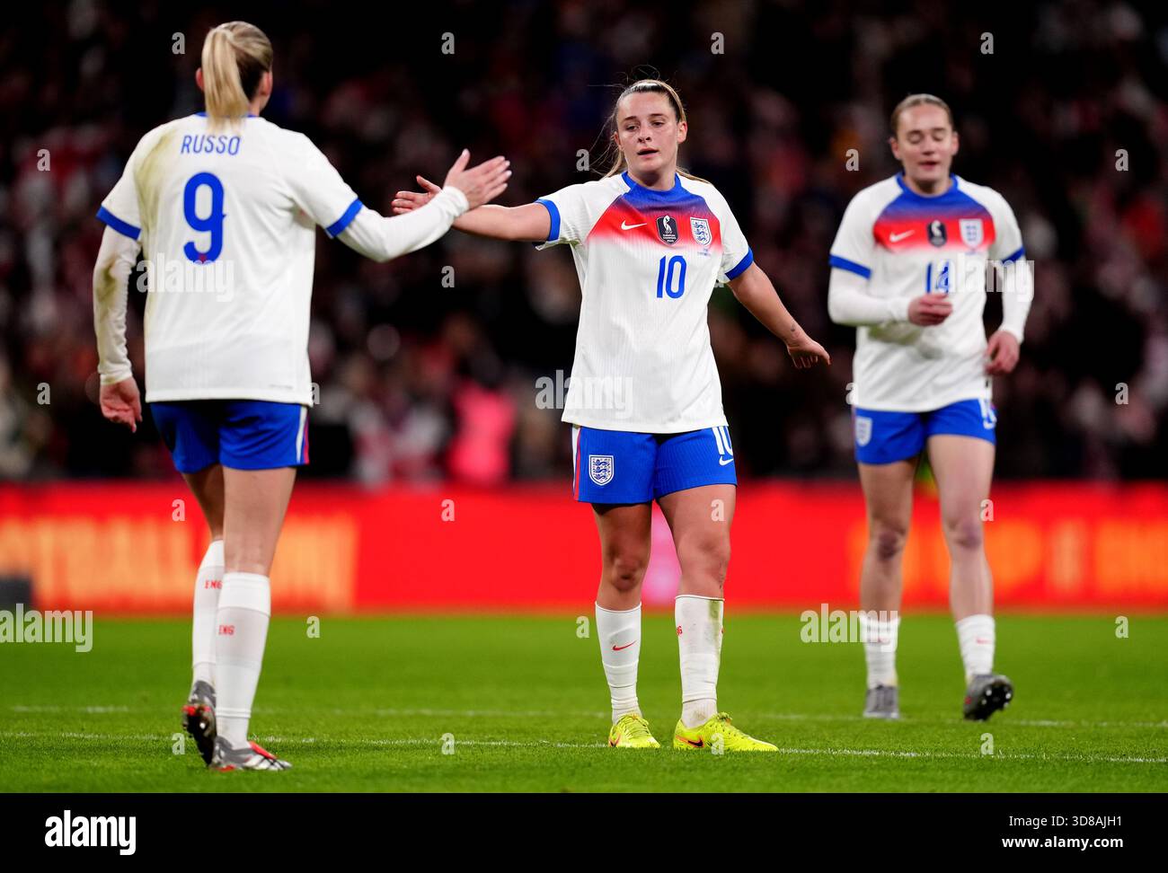 England's Ella Toone (centre) celebrates scoring their side's seventh ...