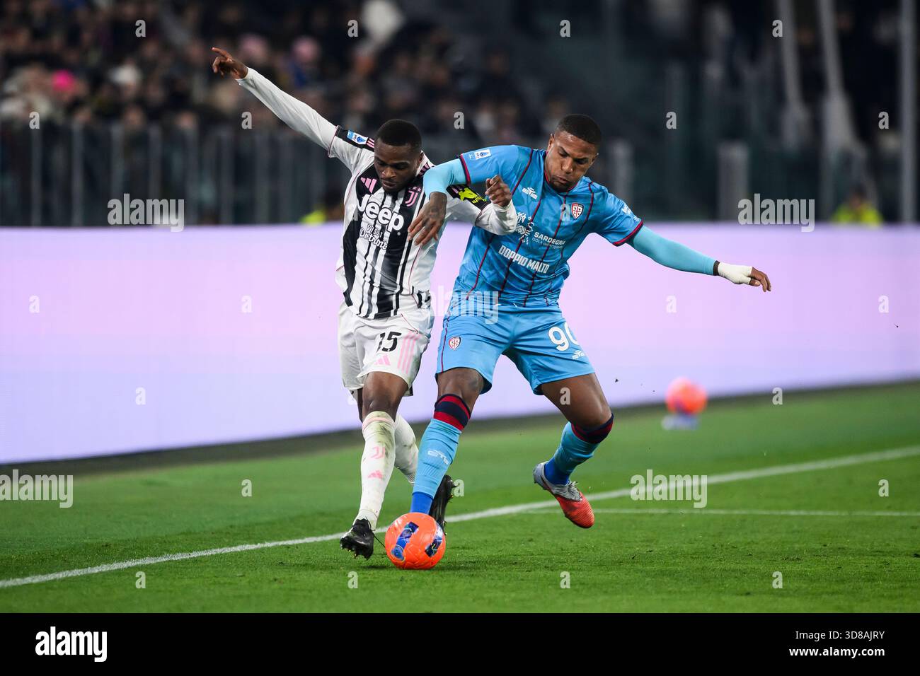 Pierre Kalulu of Juventus FC competes for the ball with Michael ...