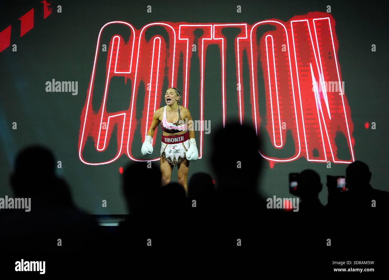 Ebonie Cotton walks out before her fight at the National Exhibition ...