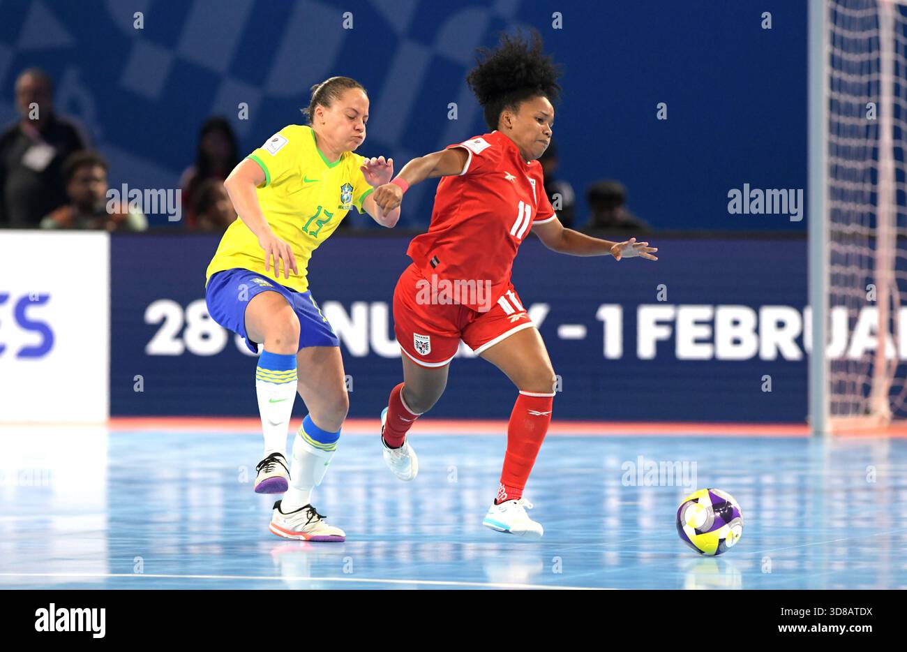 Natalia Dos Santos Fernandes (L) of Brazil Women Futsal team and Erika ...