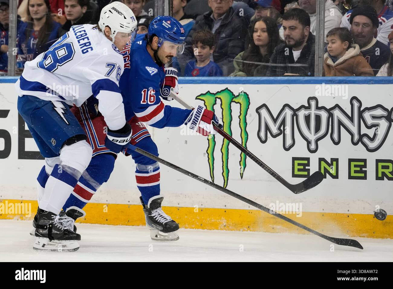 New York Rangers center Vincent Trocheck (16) fights for control of the puck with Tampa Bay ...