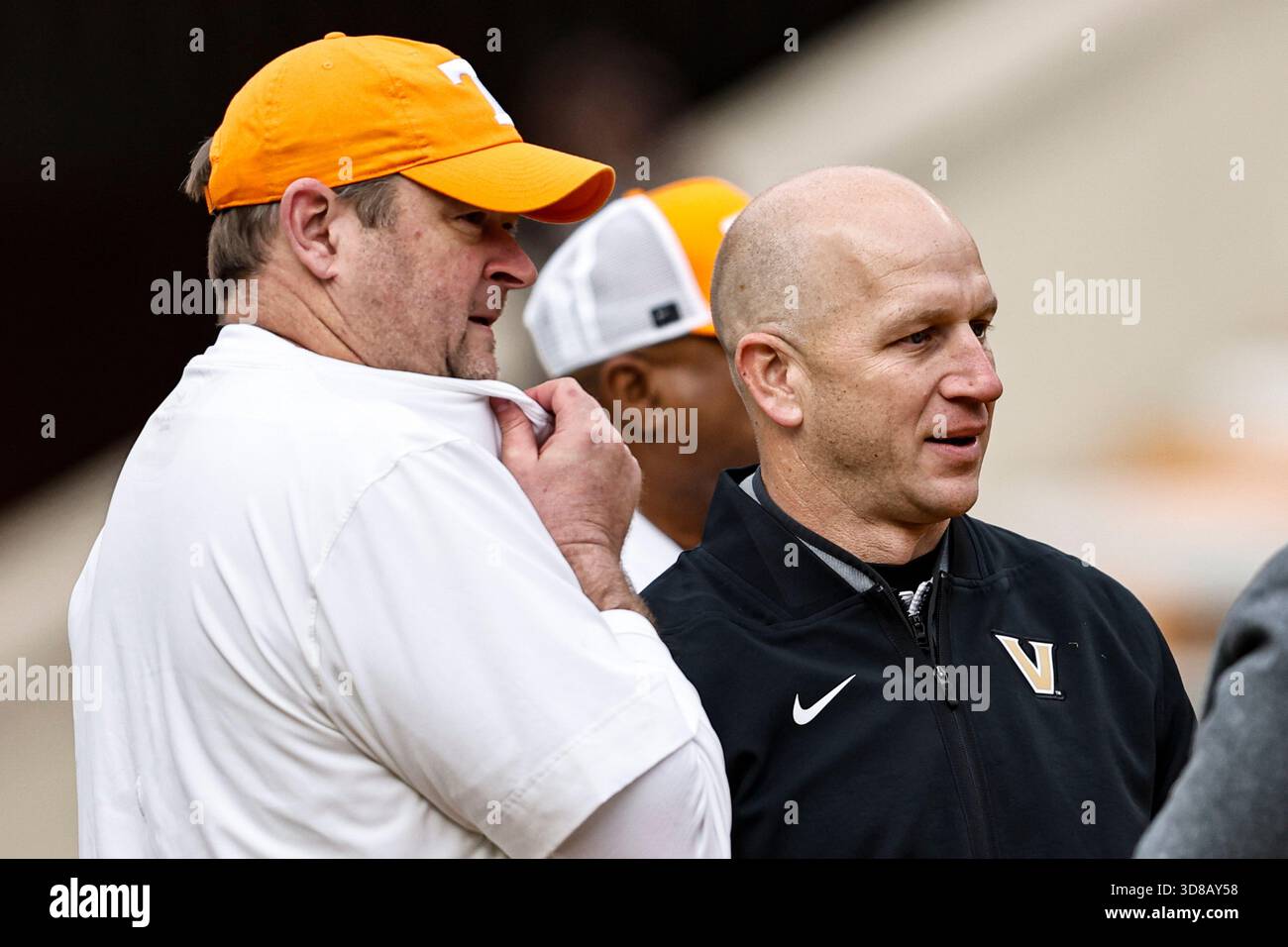 Vanderbilt head coach Clark Lea, right, and Tennessee head coach Josh ...