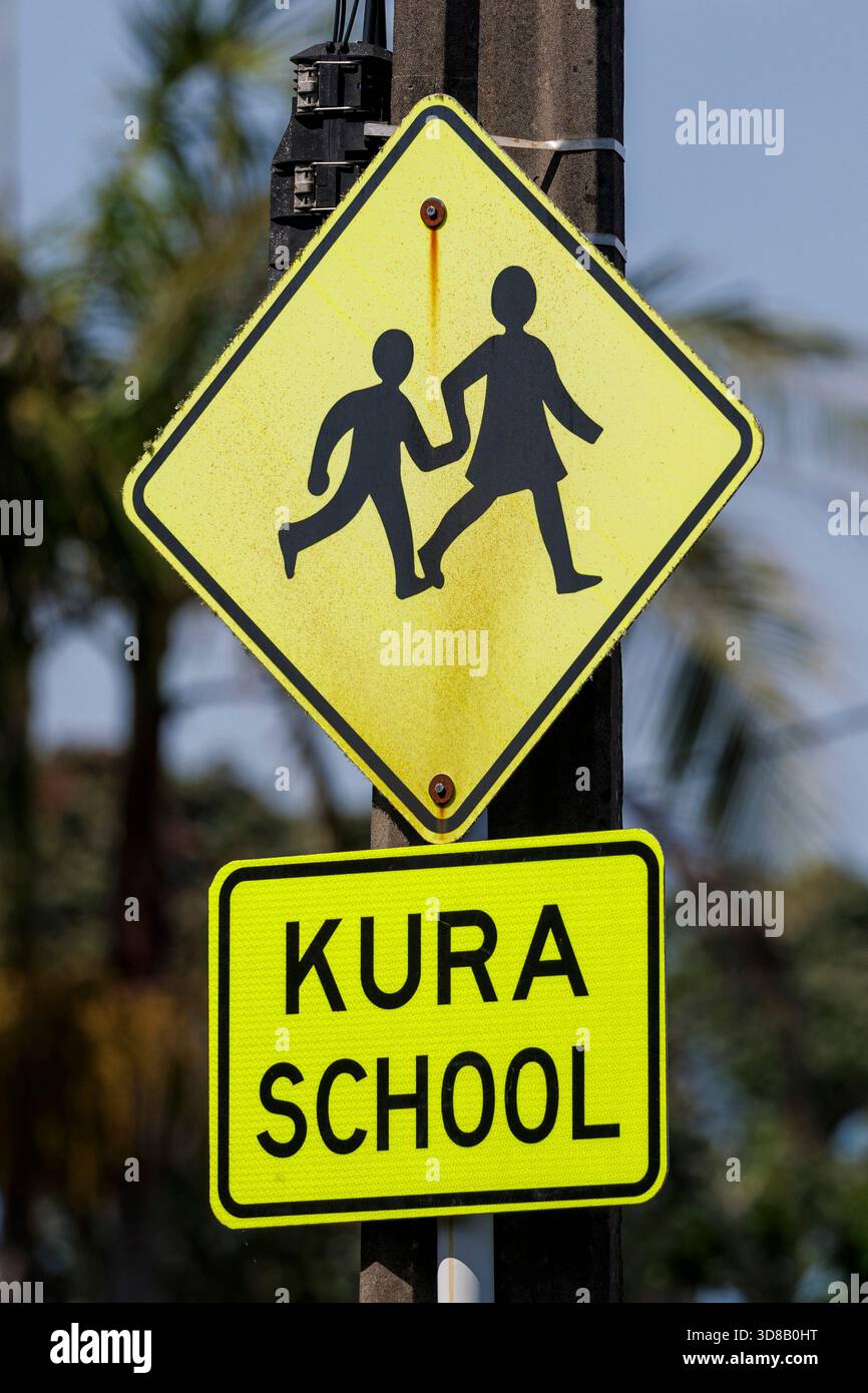 A multi lingual traffic sign indicating a children crossing for a ...