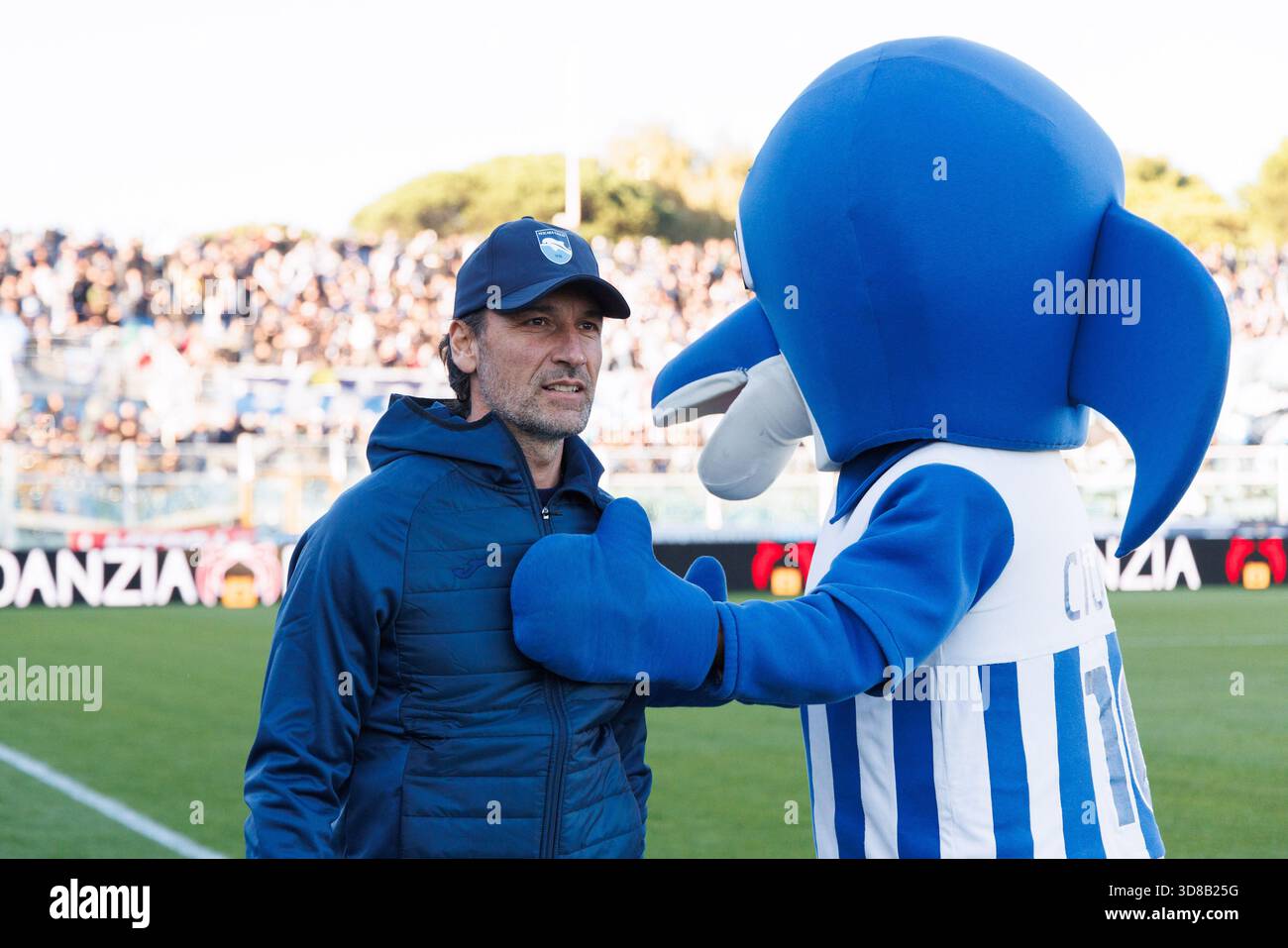 Coach Giorgio Gorgone of Pescara and mascotte Ciuffo are seen before ...