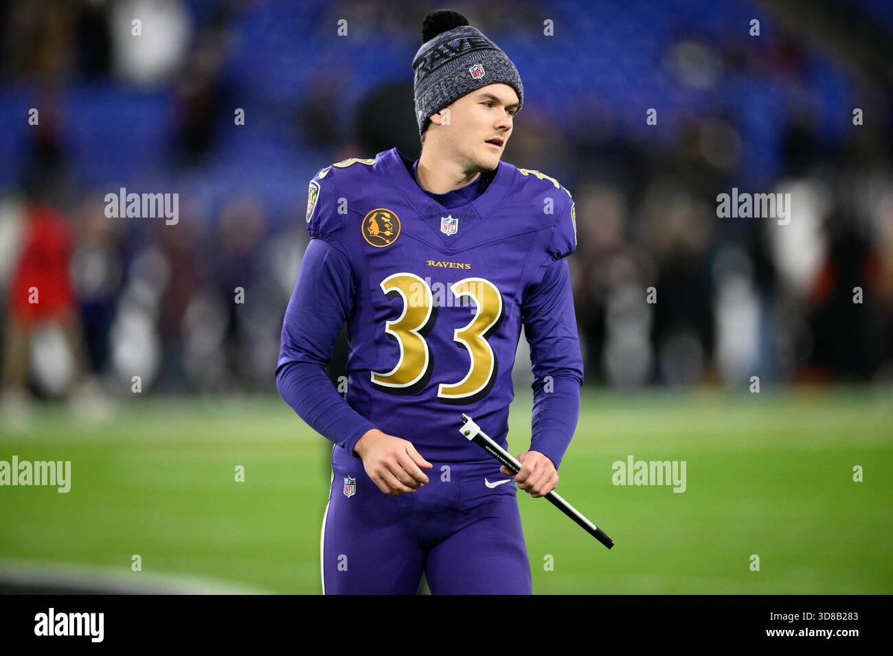 Baltimore Ravens place kicker Tyler Loop (33) warms up before an NFL ...