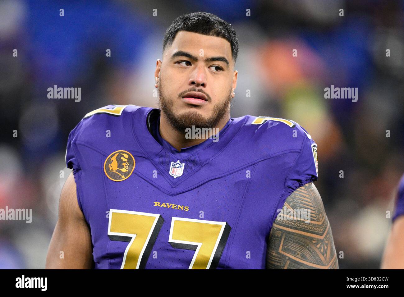 Baltimore Ravens guard Daniel Faalele (77) warms up before an NFL ...