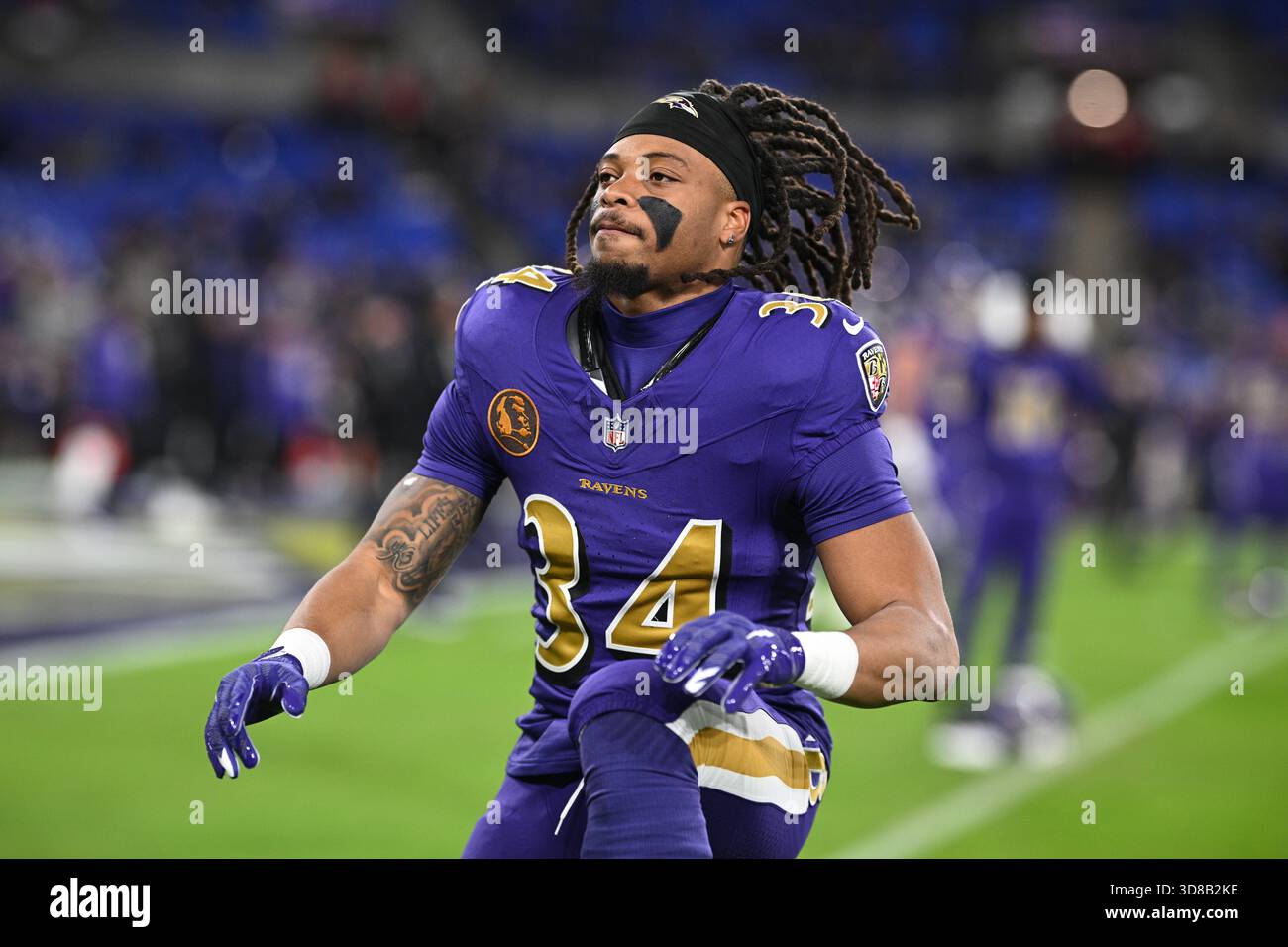 Baltimore Ravens running back Keaton Mitchell (34) warms up before an ...