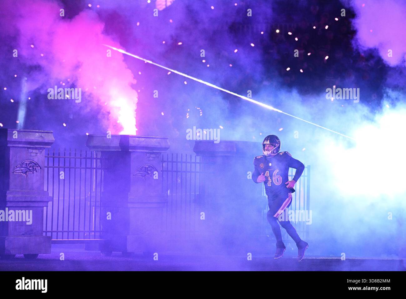 Baltimore Ravens long snapper Nick Moore (46) takes to the field before ...
