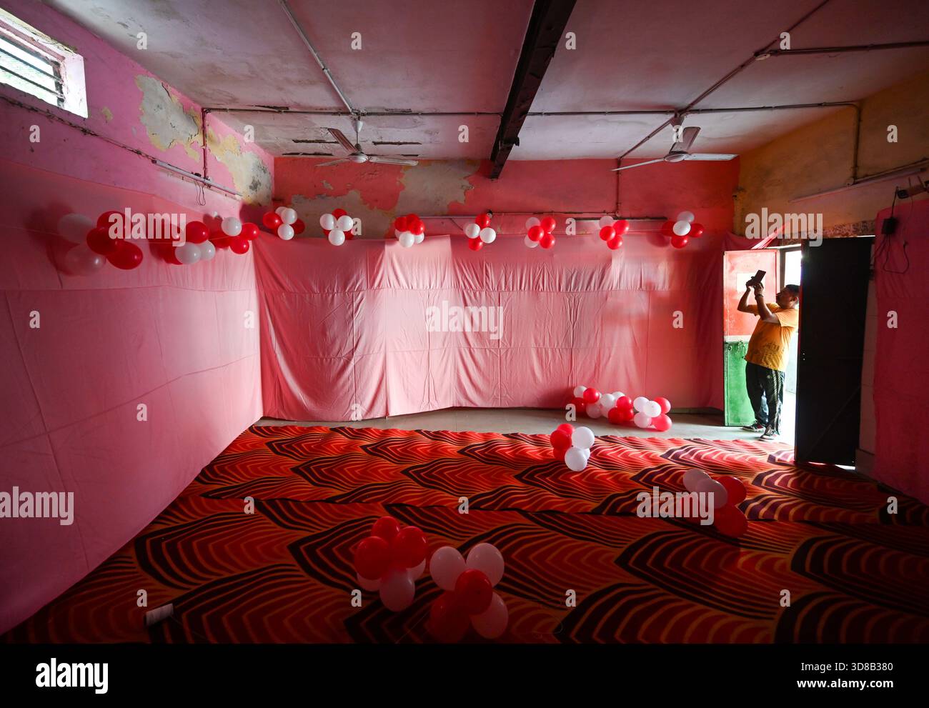 NEW DELHI, INDIA - NOVEMBER 29: Workers seen decorating a modern booth ...