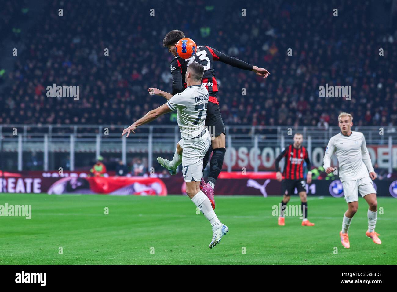 Davide Bartesaghi of AC Milan competes for the ball with Adam Marusic ...