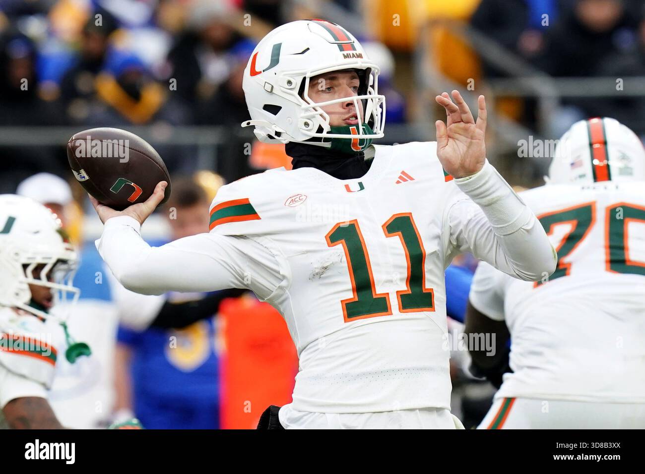 Miami quarterback Carson Beck (11) throws during the second half of an ...