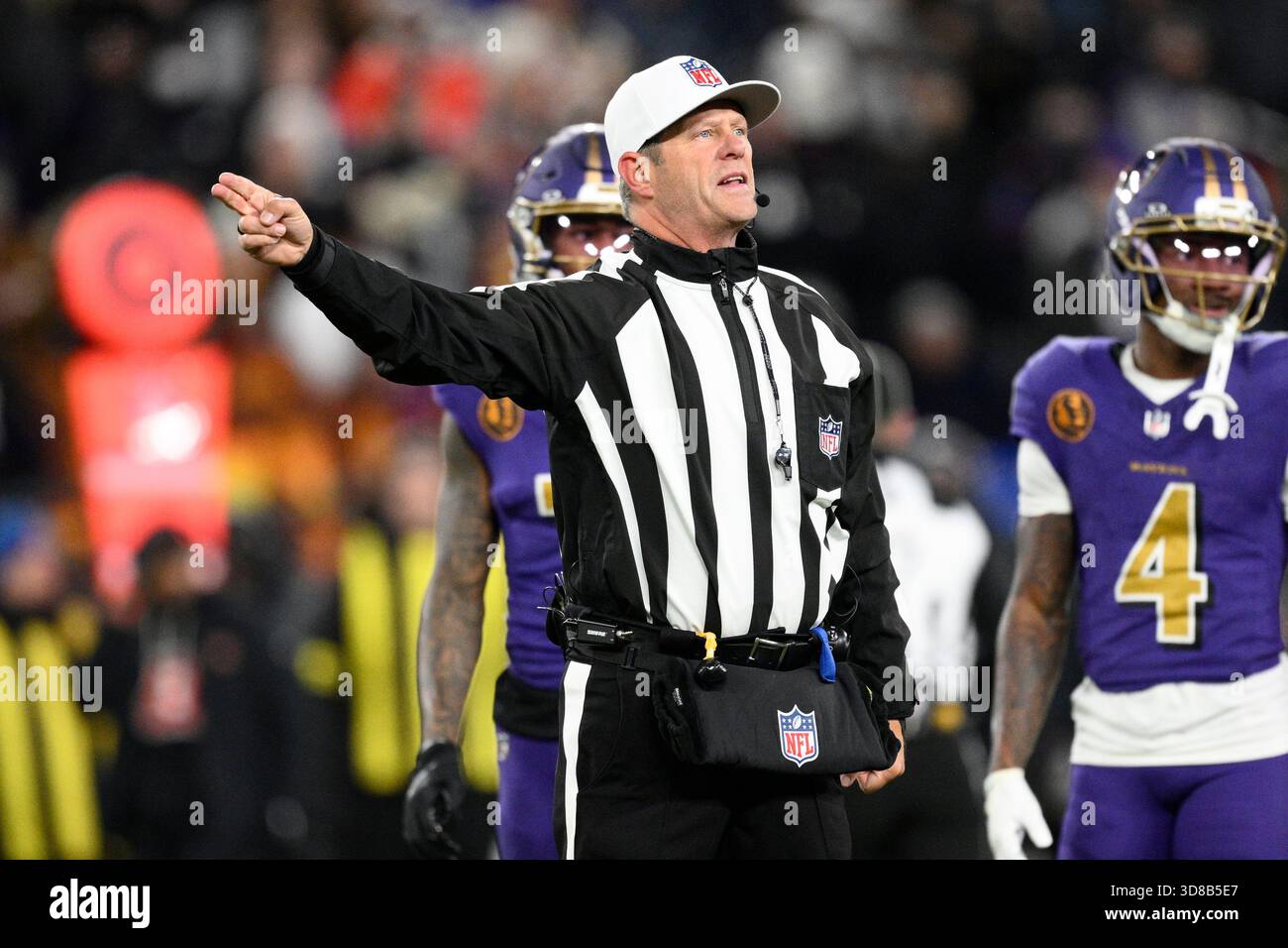 NFL referee Craig Wrolstad gestures during the second half of an NFL ...