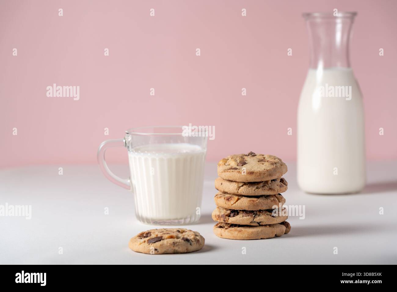 homemade chocolate chip and nut cookies centered in the frame, flanked ...