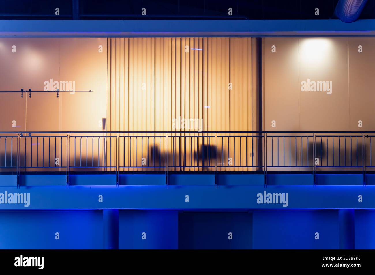 Architectural interior scene of a raised balcony corridor with frosted ...