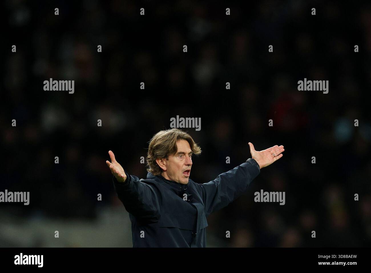 Tottenham's head coach Thomas Frank gestures from the touchline during ...