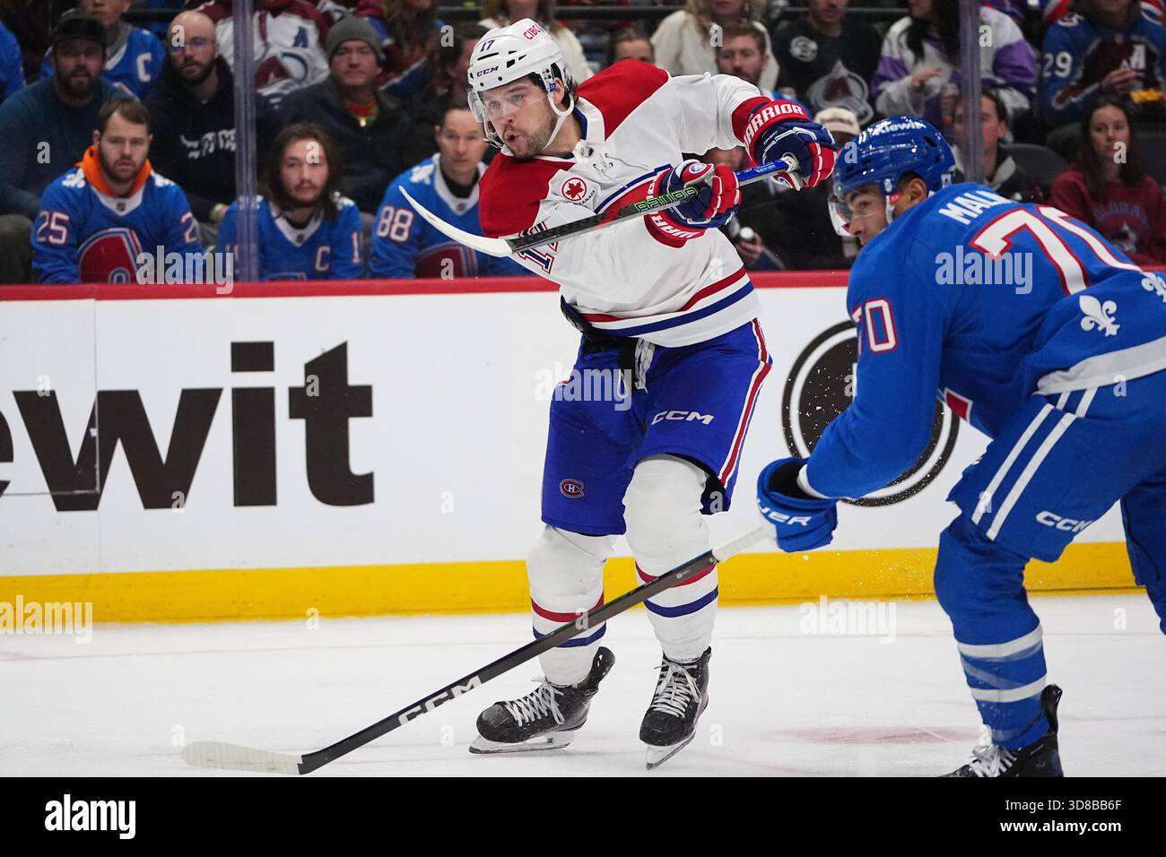 Montreal Canadiens right wing Josh Anderson, left, shoots the puck past ...