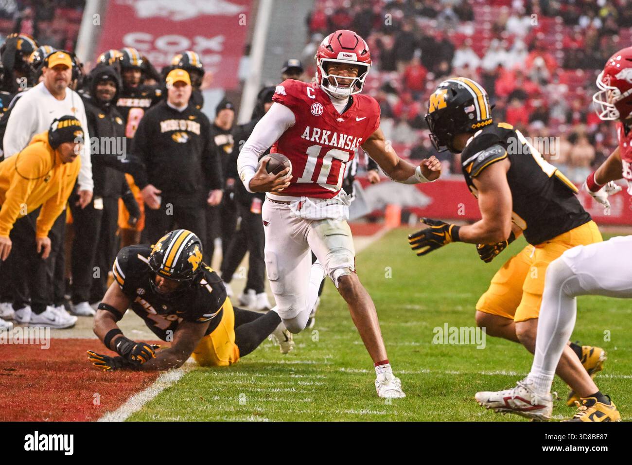 Arkansas quarterback Taylen Green (10) runs the ball against Missouri ...
