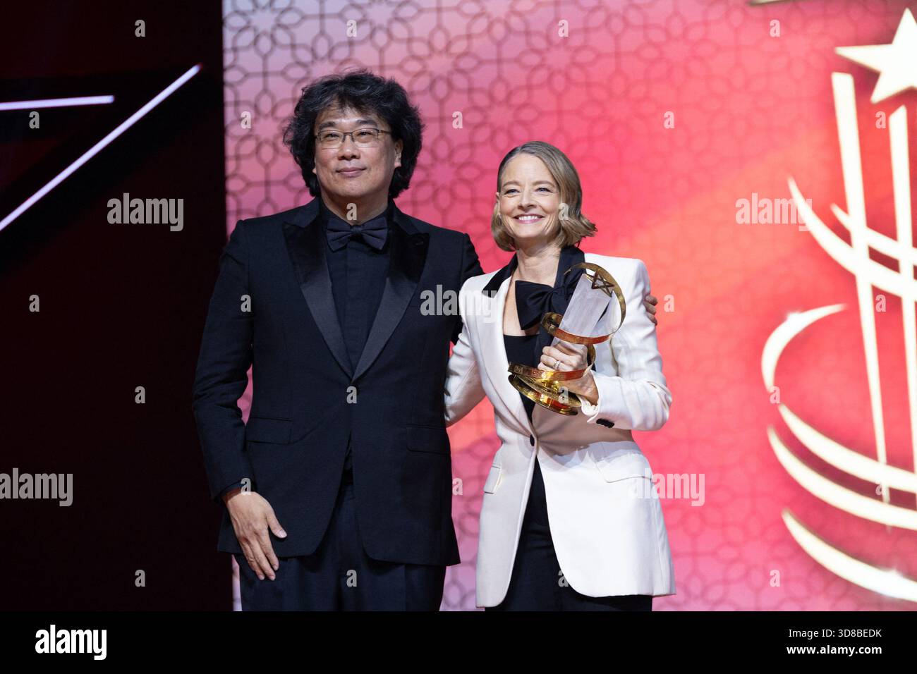 Jury president Bong Joon-ho, Jodie Foster receives the Tribute Award attends the 22nd Marrakech ...