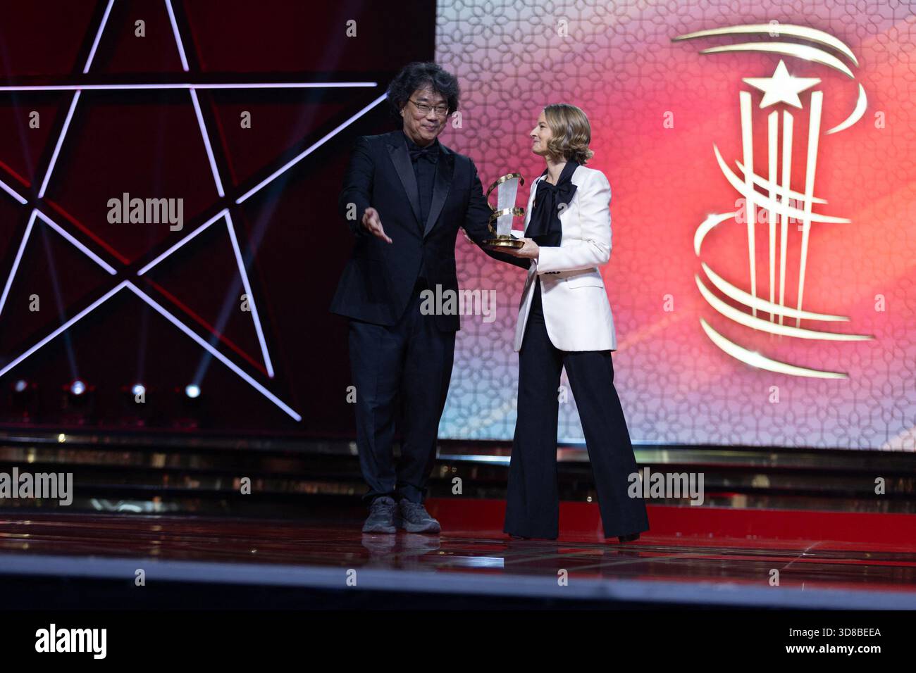 Jury president Bong Joon-ho, Jodie Foster receives the Tribute Award attends the 22nd Marrakech ...