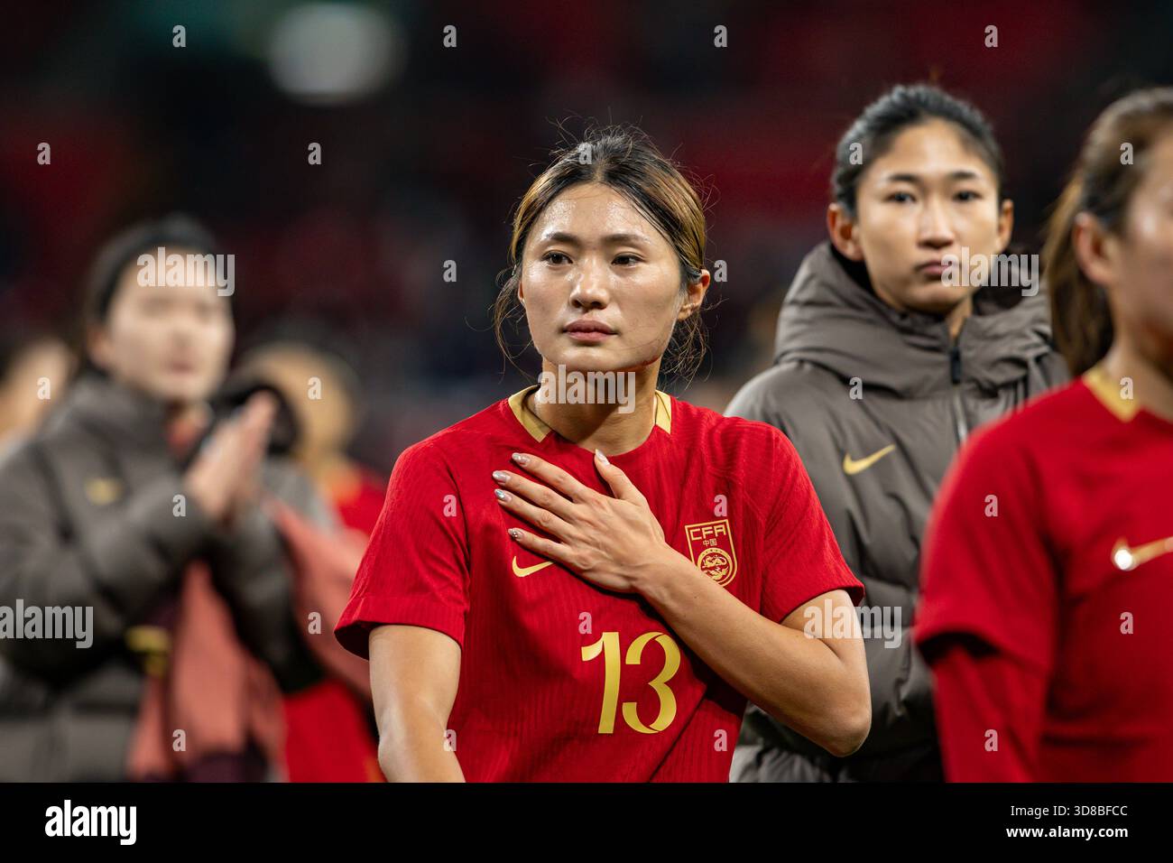 Kun Jin (13 China) thanking fans for their support during the ...