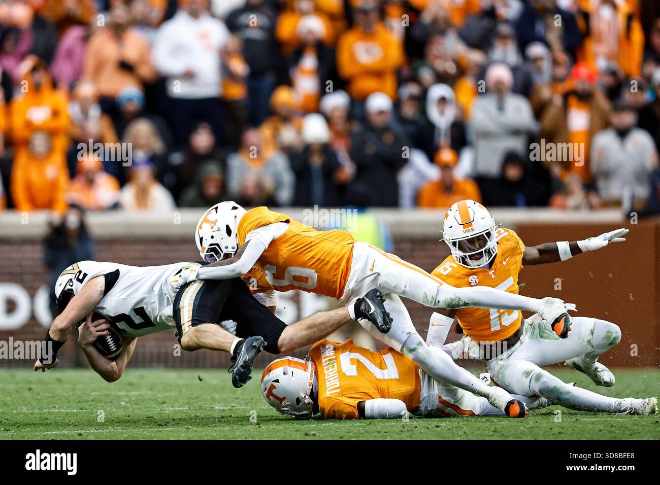 Vanderbilt quarterback Diego Pavia (2) dives forward as he's tackled by ...