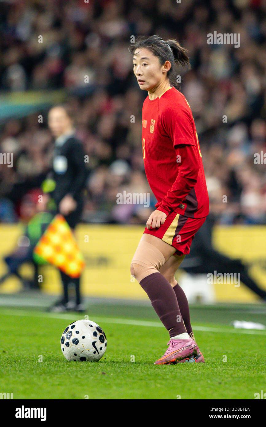 Wei Yao (8 China) runs with the ball during the international friendly game between England and ...