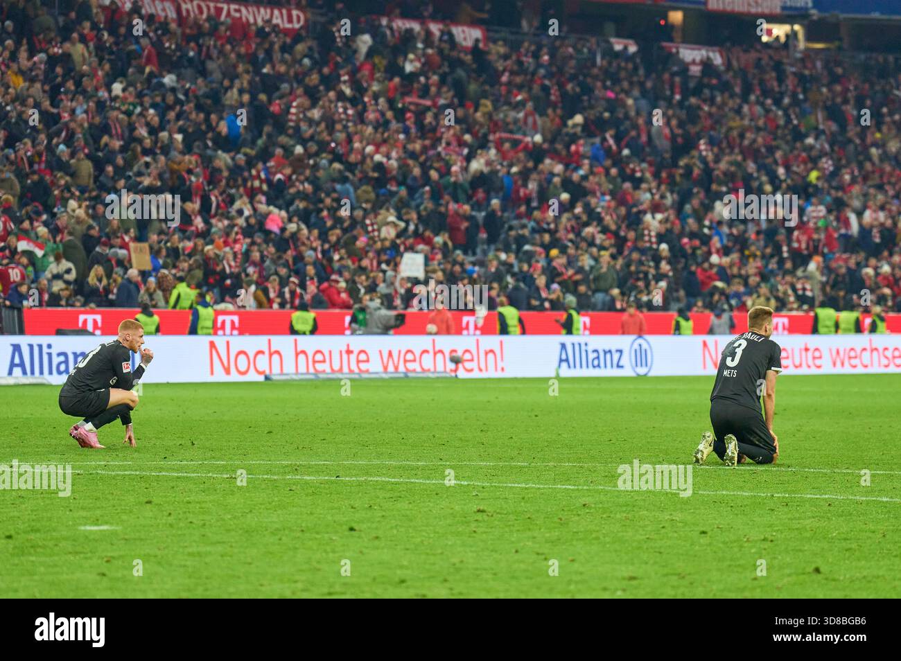 Louis Oppie of St.Pauli Karol Mets of St.Pauli disappointed after the ...