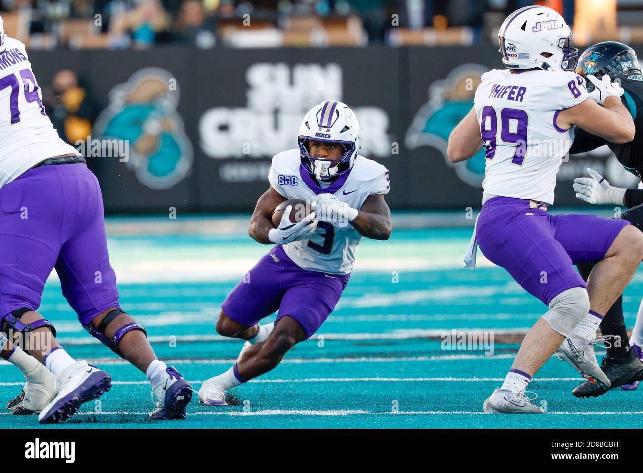 James Madison running back Wayne Knight (3) carries the football ...