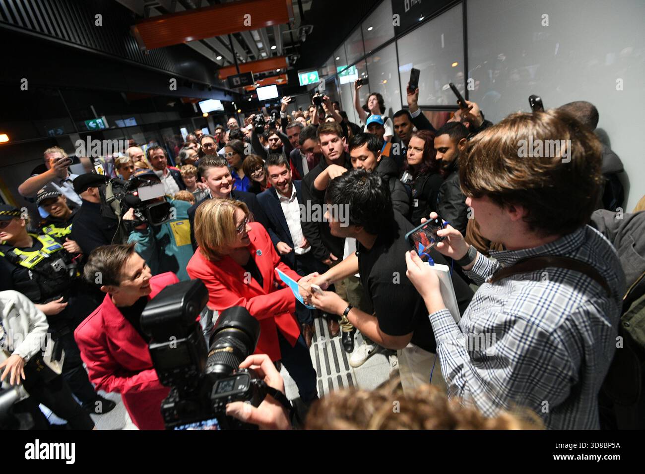 Victorian Premier Jacinta Allan greets travellers as she arrives at ...