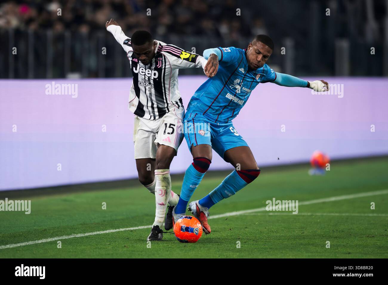 Pierre Kalulu of Juventus FC competes for the ball with Michael ...