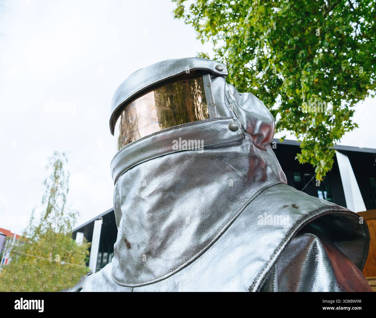 Close-up of aluminized firefighter protective hood and visor at an ...