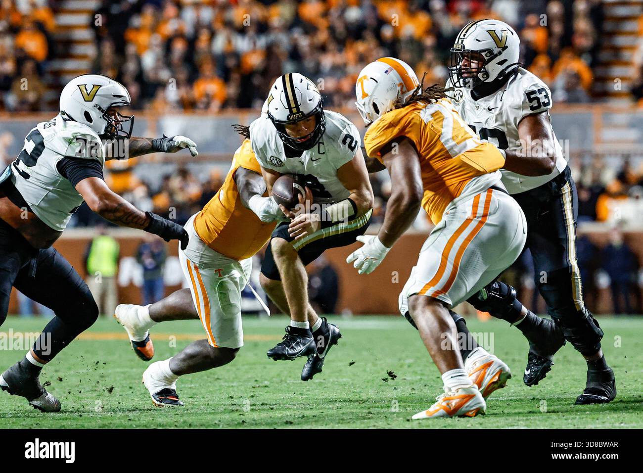 Vanderbilt quarterback Diego Pavia (2) runs for yardage as he's hit ...